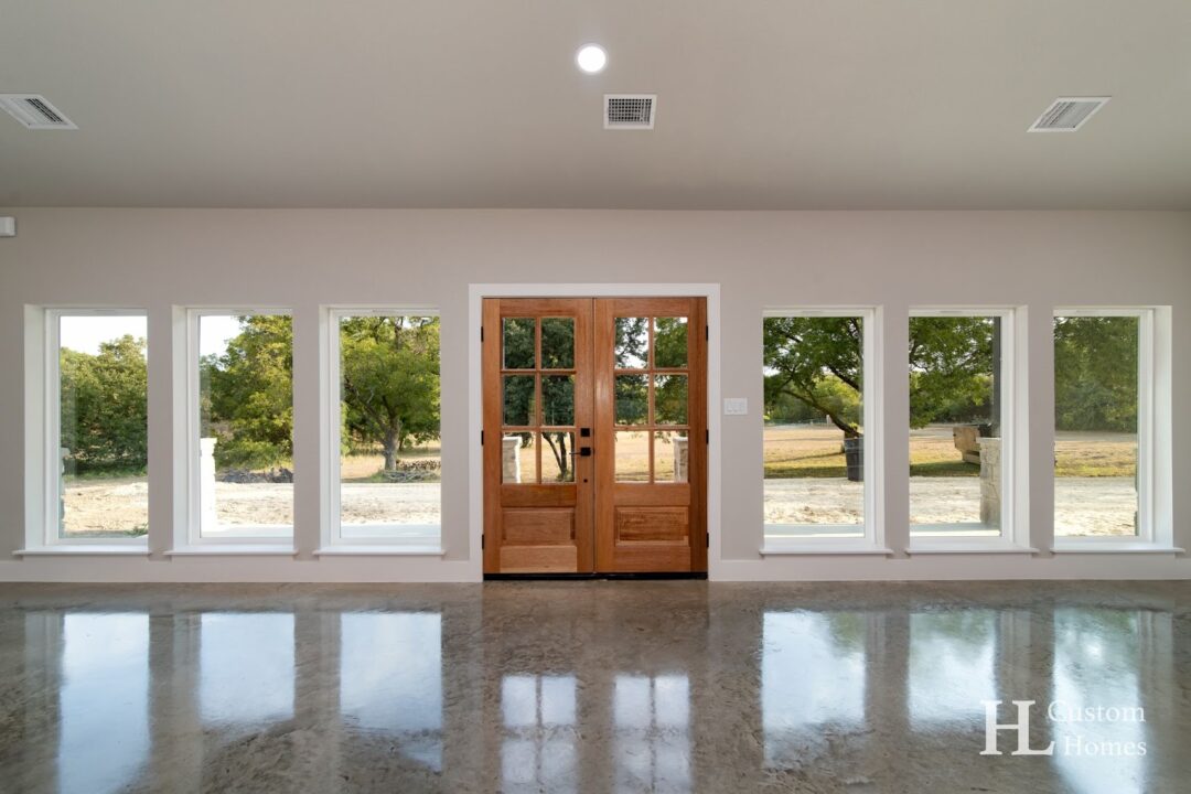 Springtown Barndominium with 2 Garages by HL Custom Homes