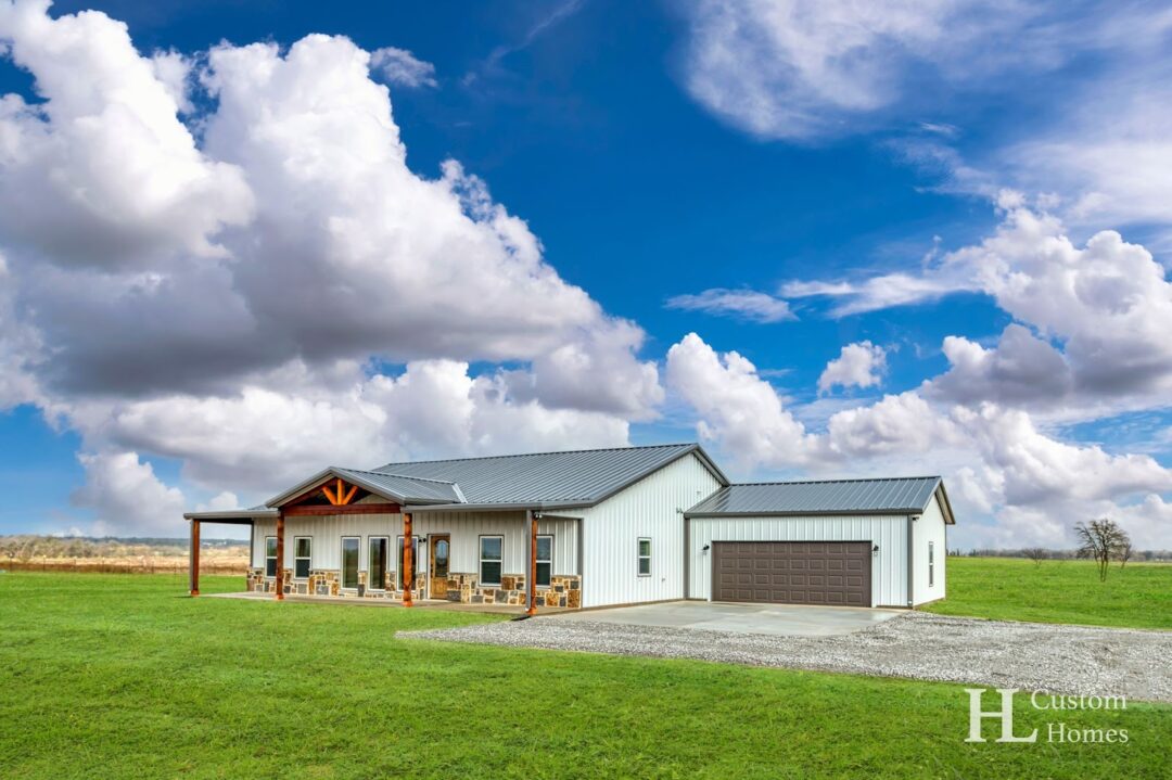 Whitt Metal Home With One Big Garage by HL Custom Homes