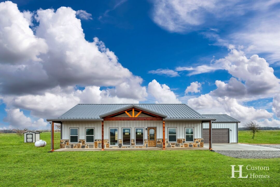 Whitt Metal Home With One Big Garage by HL Custom Homes